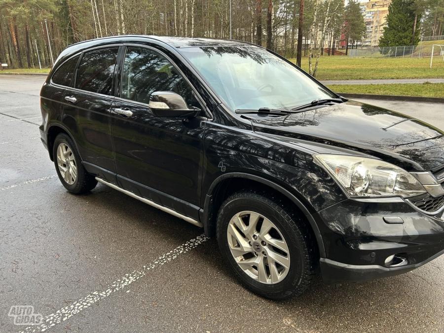 Black Honda CR-V 2010 in Visaginas, with an engine capacity of 2.20 L and mileage of 200 thousand km for 5500 €, photo 5 on AUTOMOTO.COM.LV