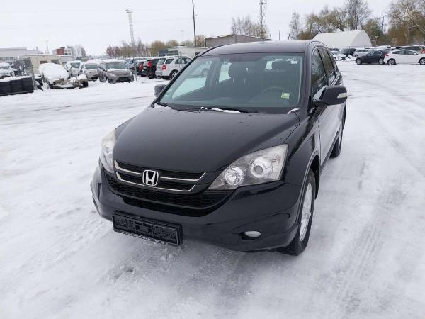 Black Honda CR-V 2010 in Marijampole, with an engine capacity of 2.00 L and mileage of 218 thousand km for 5950 €, photo 9 on AUTOMOTO.COM.LV