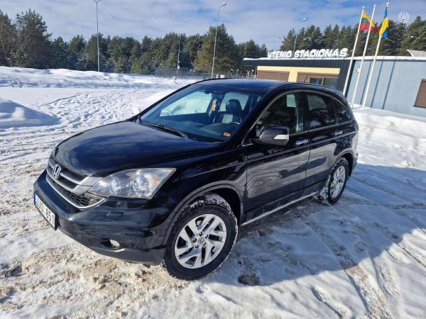 Black Honda CR-V 2010 in Utena, with an engine capacity of 2.20 L and mileage of 201 thousand km for 5600 €, photo 1 on AUTOMOTO.COM.LV