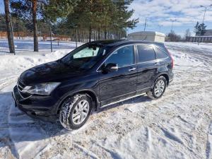 Black Honda CR-V 2010 in Utena, with an engine capacity of 2.20 L and mileage of 201 thousand km for 5600 €, photo 7 on AUTOMOTO.COM.LV
