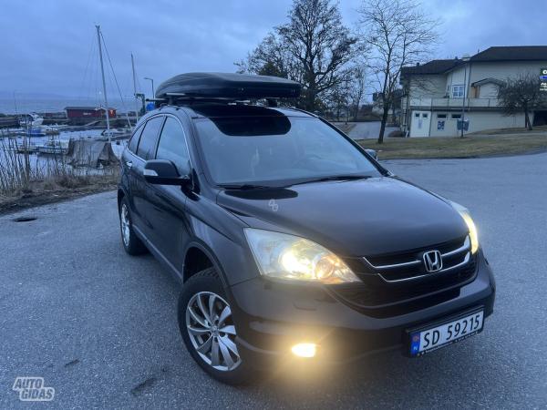 Black Honda CR-V 2010 in Marijampole, with an engine capacity of 2.00 L and mileage of 218 thousand km for 5300 €, photo 2 on AUTOMOTO.COM.LV