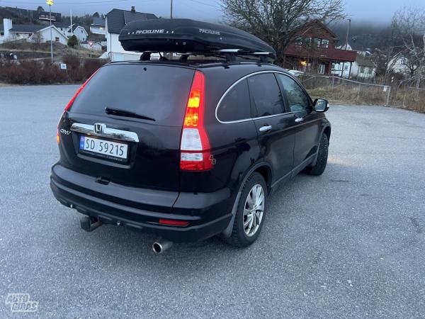 Black Honda CR-V 2010 in Marijampole, with an engine capacity of 2.00 L and mileage of 218 thousand km for 5300 €, photo 4 on AUTOMOTO.COM.LV