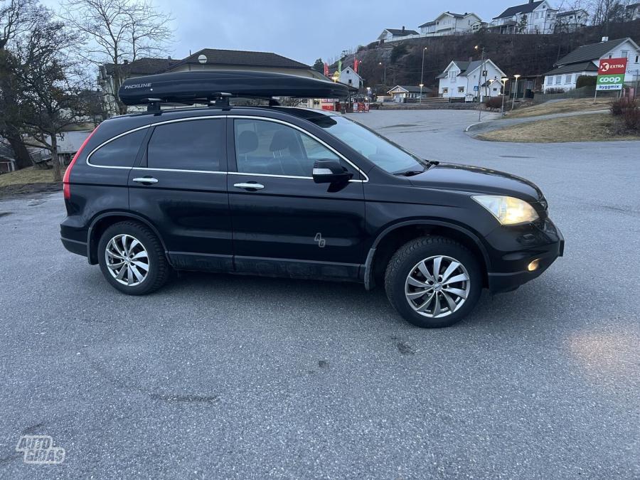 Black Honda CR-V 2010 in Marijampole, with an engine capacity of 2.00 L and mileage of 218 thousand km for 5300 €, photo 3 on AUTOMOTO.COM.LV