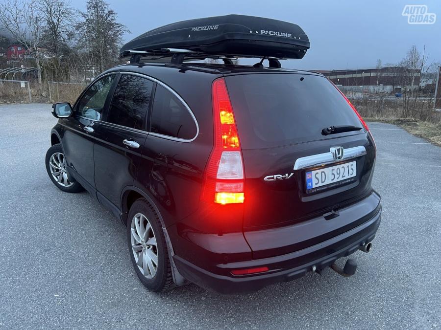 Black Honda CR-V 2010 in Marijampole, with an engine capacity of 2.00 L and mileage of 218 thousand km for 5300 €, photo 5 on AUTOMOTO.COM.LV