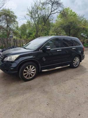 Black Honda CR-V 2010 in Vilnius, with an engine capacity of 2.20 L and mileage of 376 thousand km for 6500 €, photo  on AUTOMOTO.COM.LV