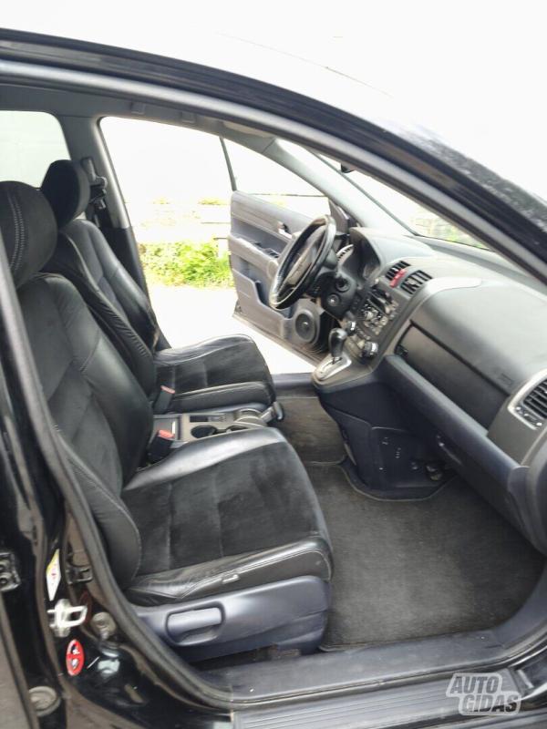 Black Honda CR-V 2010 in Vilnius, with an engine capacity of 2.20 L and mileage of 376 thousand km for 6500 €, photo 9 on AUTOMOTO.COM.LV