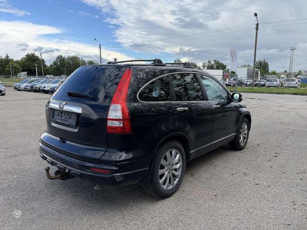 Black Honda CR-V 2010 in Marijampole, with an engine capacity of 2.20 L and mileage of 321 thousand km for 4250 €, photo 5 on AUTOMOTO.COM.LV