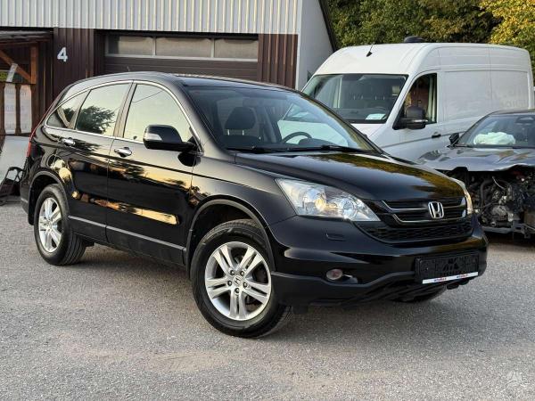 Black Honda CR-V 2010 in Siauliai, with an engine capacity of 2.20 L and mileage of 324 thousand km for 5999 €, photo 3 on AUTOMOTO.COM.LV