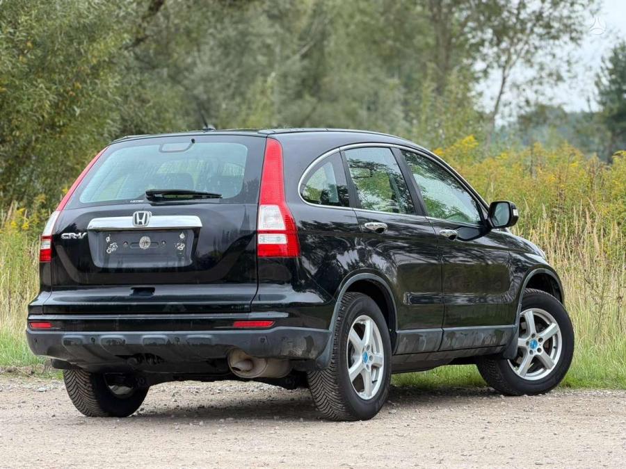 Black Honda CR-V 2010 in Kaunas, with an engine capacity of 2.20 L and mileage of 282 thousand km for 6900 €, photo 6 on AUTOMOTO.COM.LV