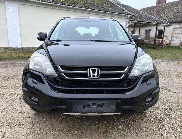 Black Honda CR-V 2011 in Kaisiadorys, with an engine capacity of 2.20 L and mileage of 293 thousand km for 6250 €, photo 3 on AUTOMOTO.COM.LV