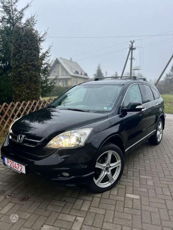 Melns Honda CR-V 2011 Kauņa, ar dzinēja tilpumu 2.00 L un nobraukumu 279 tūkst. km par 6800 €, foto 1 vietnē AUTOMOTO.COM.LV