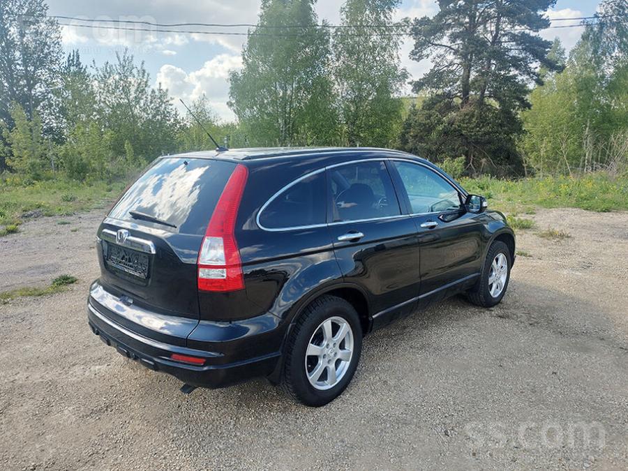 Black Honda CR-V 2011 in Riga, with an engine capacity of 2.20 L and mileage of 205 thousand km for 7950 €, photo 4 on AUTOMOTO.COM.LV