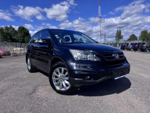 Black Honda CR-V 2011 in Alytus, with an engine capacity of 2.20 L and mileage of 235 thousand km for 8300 €, photo 3 on AUTOMOTO.COM.LV