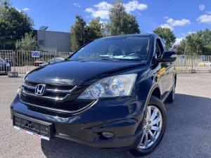 Black Honda CR-V 2011 in Alytus, with an engine capacity of 2.20 L and mileage of 235 thousand km for 8300 €, photo 4 on AUTOMOTO.COM.LV