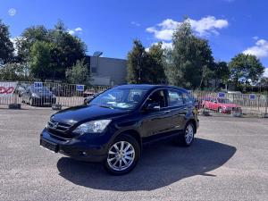 Black Honda CR-V 2011 in Alytus, with an engine capacity of 2.20 L and mileage of 235 thousand km for 8300 €, photo 6 on AUTOMOTO.COM.LV