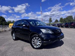 Black Honda CR-V 2011 in Alytus, with an engine capacity of 2.20 L and mileage of 235 thousand km for 8300 €, photo 7 on AUTOMOTO.COM.LV