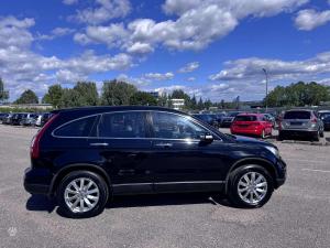 Black Honda CR-V 2011 in Alytus, with an engine capacity of 2.20 L and mileage of 235 thousand km for 8300 €, photo 8 on AUTOMOTO.COM.LV