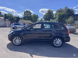 Black Honda CR-V 2011 in Alytus, with an engine capacity of 2.20 L and mileage of 235 thousand km for 8300 €, photo 9 on AUTOMOTO.COM.LV