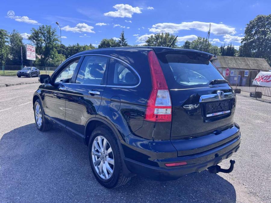 Black Honda CR-V 2011 in Alytus, with an engine capacity of 2.20 L and mileage of 235 thousand km for 8300 €, photo 11 on AUTOMOTO.COM.LV