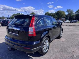 Black Honda CR-V 2011 in Alytus, with an engine capacity of 2.20 L and mileage of 235 thousand km for 8300 €, photo 12 on AUTOMOTO.COM.LV