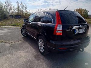 Black Honda CR-V 2011 in Alytus, with an engine capacity of 2.20 L and mileage of 242 thousand km for 7650 €, photo 7 on AUTOMOTO.COM.LV