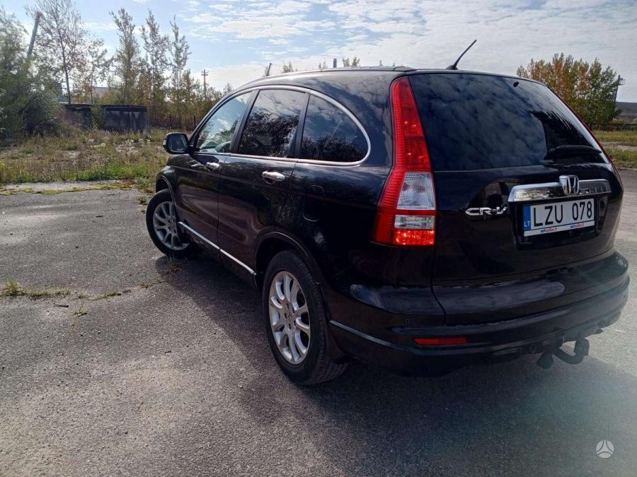 Black Honda CR-V 2011 in Alytus, with an engine capacity of 2.20 L and mileage of 242 thousand km for 7650 €, photo 7 on AUTOMOTO.COM.LV