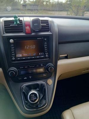 Black Honda CR-V 2011 in Alytus, with an engine capacity of 2.20 L and mileage of 242 thousand km for 7650 €, photo 9 on AUTOMOTO.COM.LV
