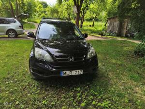 Black Honda CR-V 2011 in Vilnius, with an engine capacity of 2.20 L and mileage of 490 thousand km for 4600 €, photo  on AUTOMOTO.COM.LV