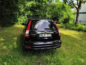 Black Honda CR-V 2011 in Vilnius, with an engine capacity of 2.20 L and mileage of 490 thousand km for 4600 €, photo 3 on AUTOMOTO.COM.LV