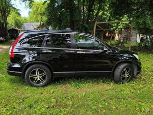 Black Honda CR-V 2011 in Vilnius, with an engine capacity of 2.20 L and mileage of 490 thousand km for 4600 €, photo 5 on AUTOMOTO.COM.LV