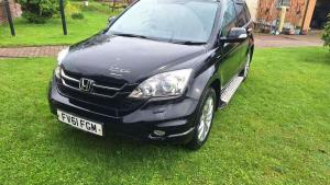 Melns Honda CR-V 2011 Tauragė, ar dzinēja tilpumu 2.20 L un nobraukumu 174 tūkst. km par 3100 €, foto  vietnē AUTOMOTO.COM.LV