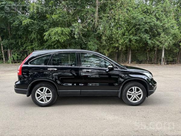 Black Honda CR-V 2012 in Ogre, with an engine capacity of 2.20 L and mileage of 264 thousand km for 7100 €, photo 1 on AUTOMOTO.COM.LV
