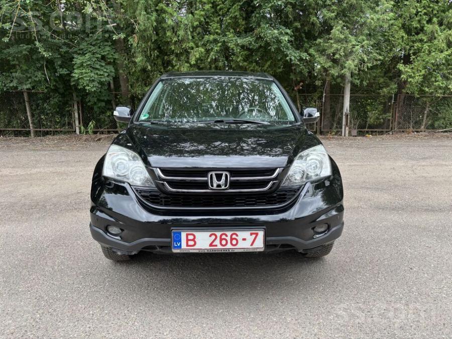Black Honda CR-V 2012 in Ogre, with an engine capacity of 2.20 L and mileage of 264 thousand km for 7100 €, photo 5 on AUTOMOTO.COM.LV
