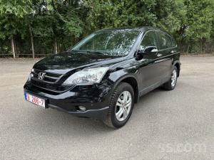 Black Honda CR-V 2012 in Ogre, with an engine capacity of 2.20 L and mileage of 264 thousand km for 7100 €, photo 6 on AUTOMOTO.COM.LV