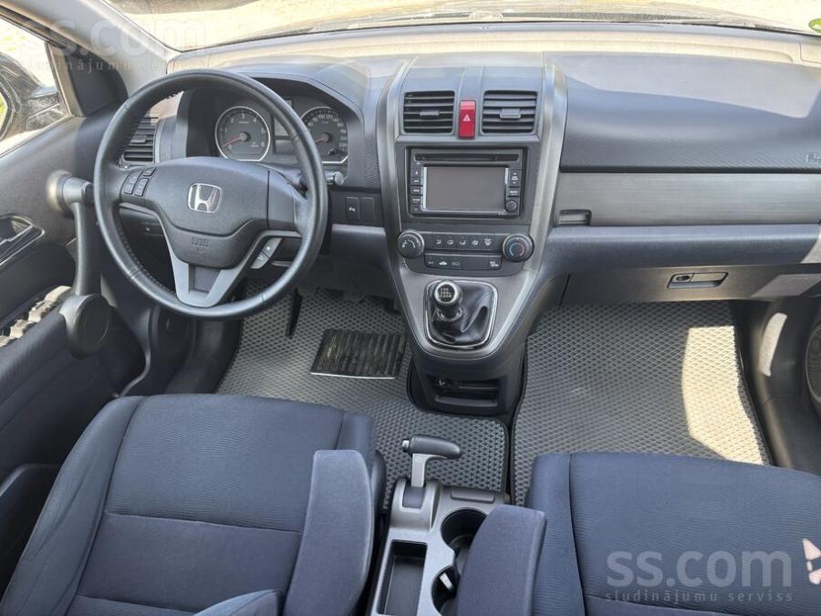 Black Honda CR-V 2012 in Ogre, with an engine capacity of 2.20 L and mileage of 264 thousand km for 7100 €, photo 11 on AUTOMOTO.COM.LV