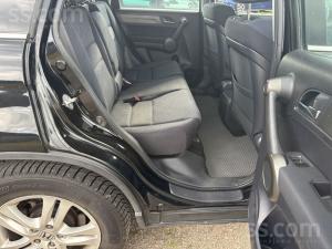 Black Honda CR-V 2012 in Ogre, with an engine capacity of 2.20 L and mileage of 264 thousand km for 7100 €, photo 13 on AUTOMOTO.COM.LV