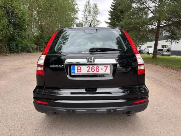 Black Honda CR-V 2012 in Ogre, with an engine capacity of 2.20 L and mileage of 264 thousand km for 7100 €, photo 8 on AUTOMOTO.COM.LV