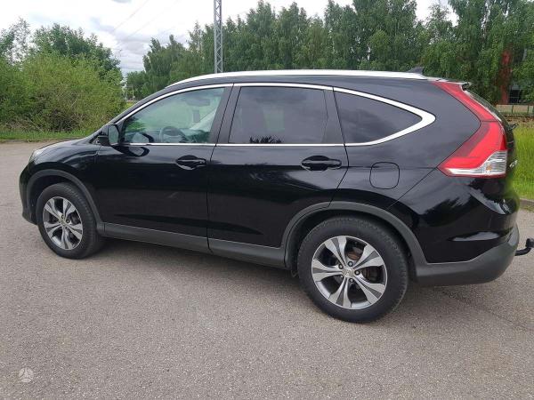 Black Honda CR-V 2012 in Radviliskis, with an engine capacity of 2.20 L and mileage of 278 thousand km for 9900 €, photo 4 on AUTOMOTO.COM.LV