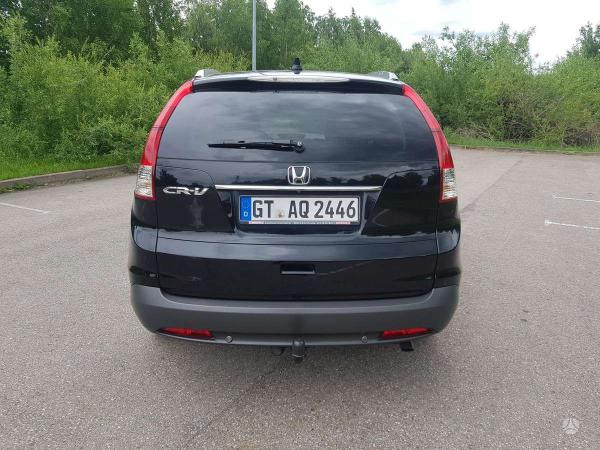 Black Honda CR-V 2012 in Radviliskis, with an engine capacity of 2.20 L and mileage of 278 thousand km for 9900 €, photo 6 on AUTOMOTO.COM.LV