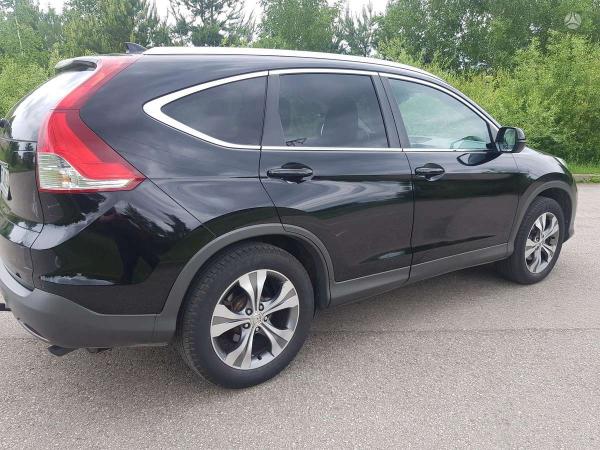 Black Honda CR-V 2012 in Radviliskis, with an engine capacity of 2.20 L and mileage of 278 thousand km for 9900 €, photo 8 on AUTOMOTO.COM.LV