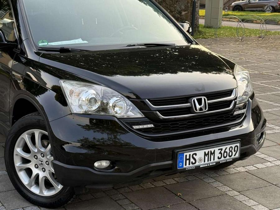 Black Honda CR-V 2012 in Kaunas, with an engine capacity of 2.20 L and mileage of 184 thousand km for 6999 €, photo 5 on AUTOMOTO.COM.LV