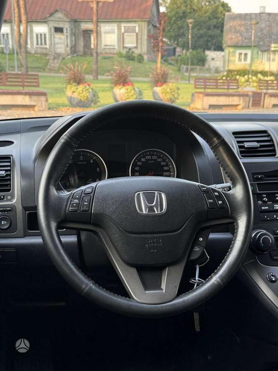 Black Honda CR-V 2012 in Kaunas, with an engine capacity of 2.20 L and mileage of 184 thousand km for 6999 €, photo 10 on AUTOMOTO.COM.LV