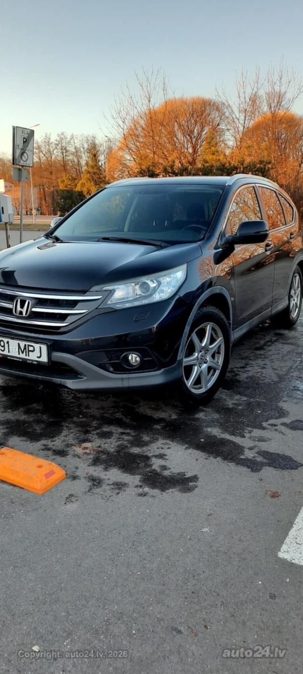 Black Honda CR-V 2013 in Tallinn, with an engine capacity of 2.00 L and mileage of 294 thousand km for 10900 €, photo 1 on AUTOMOTO.COM.LV