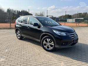 Black Honda CR-V 2013 in Vilnius, with an engine capacity of 2.20 L and mileage of 143 thousand km for 15500 €, photo  on AUTOMOTO.COM.LV