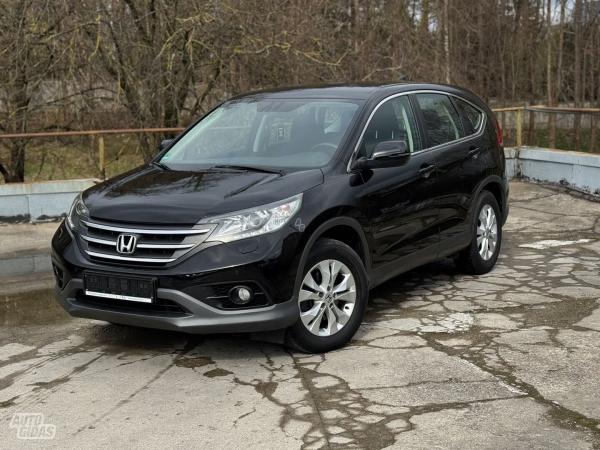 Black Honda CR-V 2013 in Vilnius, with an engine capacity of 2.20 L and mileage of 179 thousand km for 10900 €, photo 1 on AUTOMOTO.COM.LV
