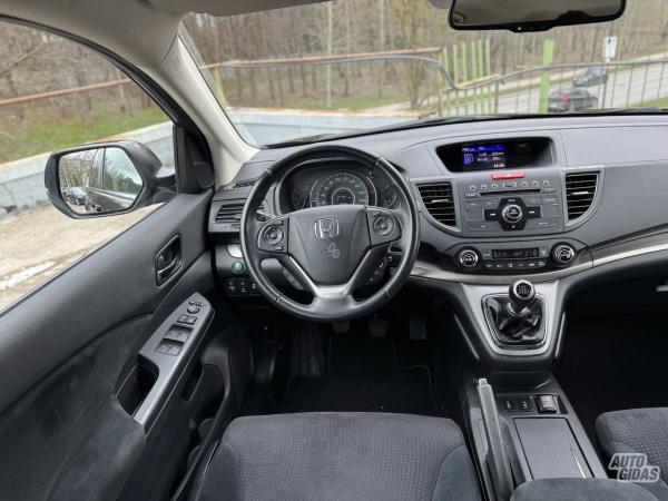 Black Honda CR-V 2013 in Vilnius, with an engine capacity of 2.20 L and mileage of 179 thousand km for 10900 €, photo 4 on AUTOMOTO.COM.LV