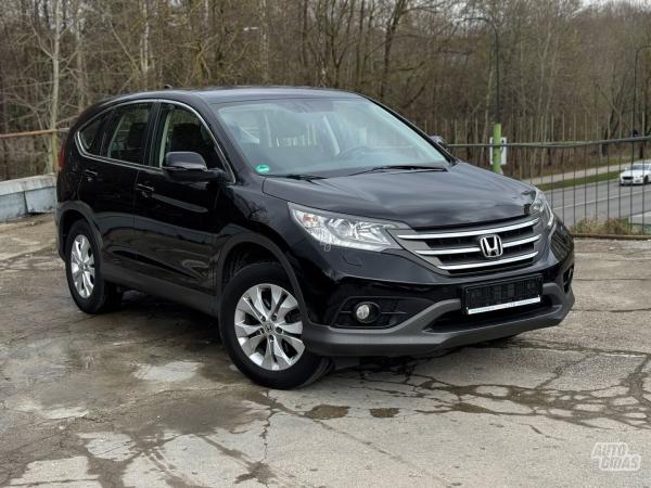 Black Honda CR-V 2013 in Vilnius, with an engine capacity of 2.20 L and mileage of 179 thousand km for 10900 €, photo 9 on AUTOMOTO.COM.LV