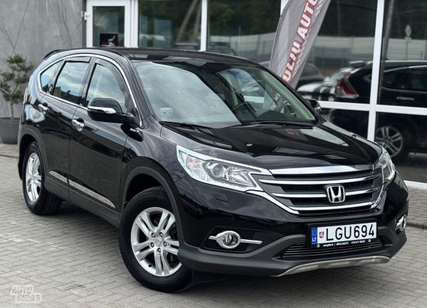 Black Honda CR-V 2013 in Radviliskis, with an engine capacity of 2.20 L and mileage of 218 thousand km for 9250 €, photo 2 on AUTOMOTO.COM.LV