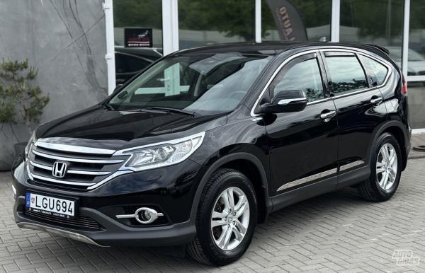 Black Honda CR-V 2013 in Radviliskis, with an engine capacity of 2.20 L and mileage of 218 thousand km for 9250 €, photo 3 on AUTOMOTO.COM.LV