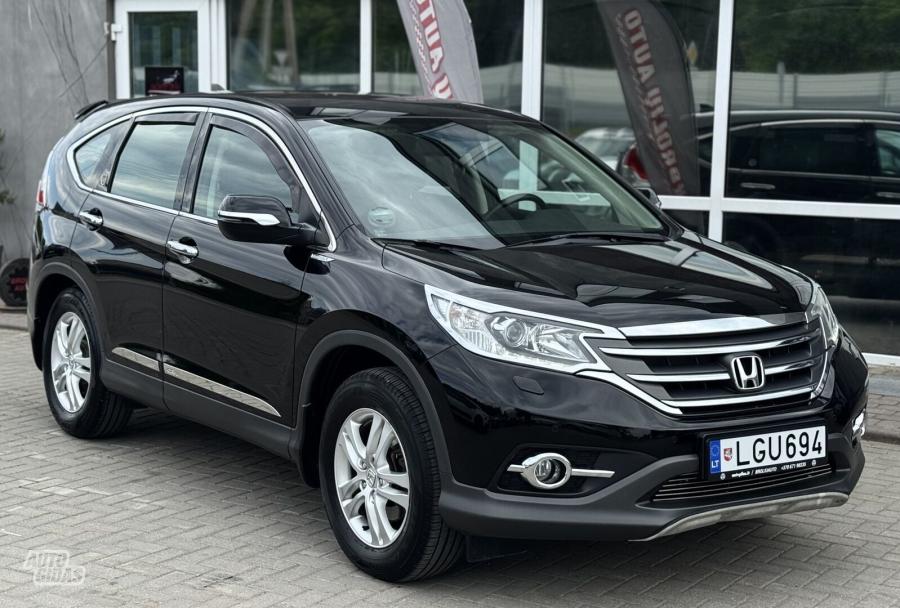 Black Honda CR-V 2013 in Radviliskis, with an engine capacity of 2.20 L and mileage of 218 thousand km for 9250 €, photo 5 on AUTOMOTO.COM.LV